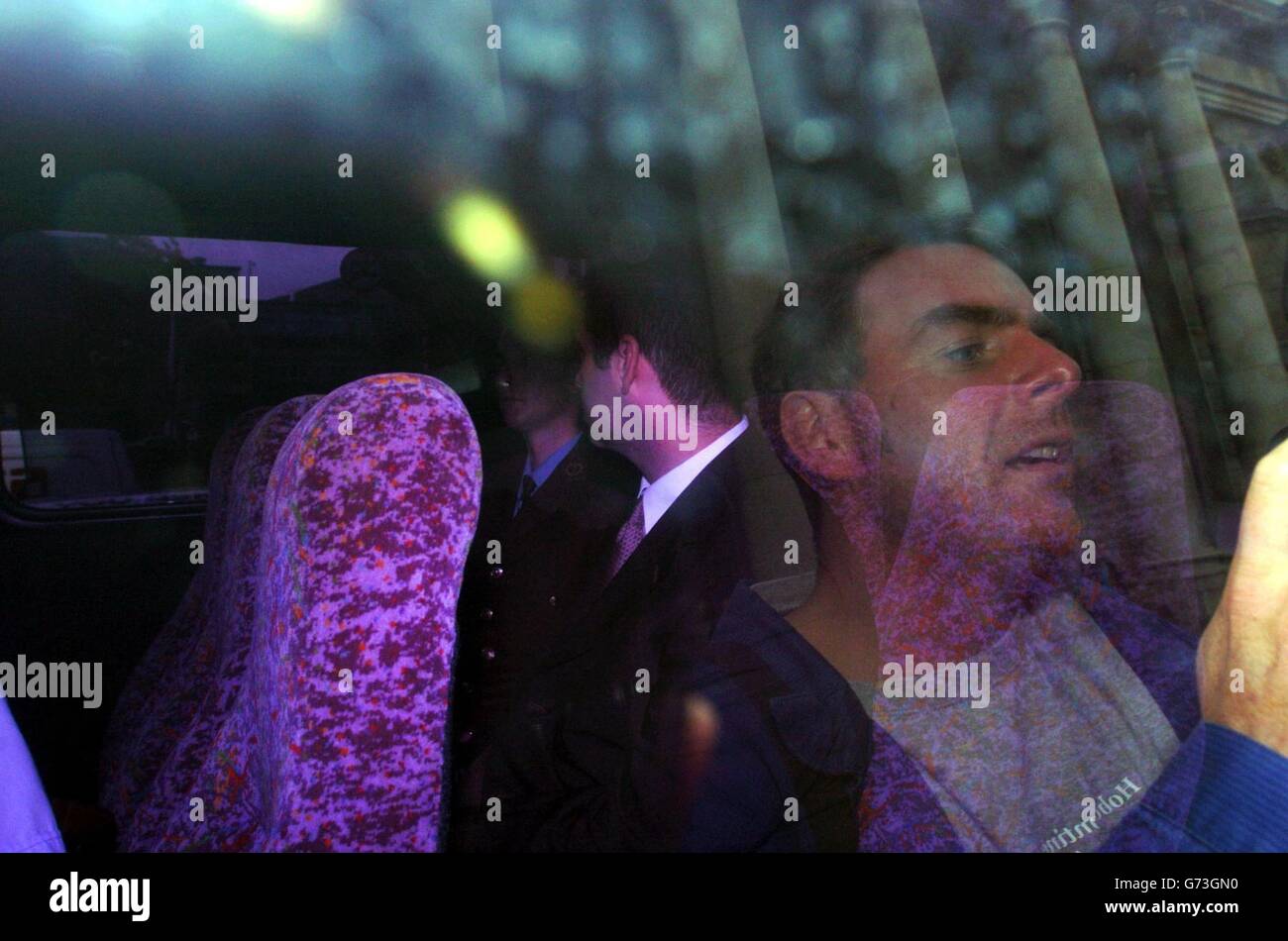 Colin Whelan (centre facing away white shirt), who was extradited from ...