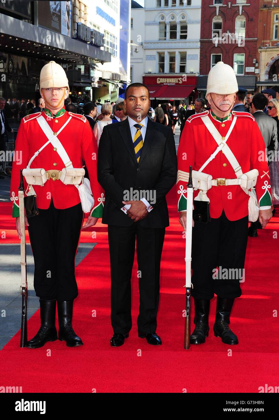Johnson Beharry (centre) attending the 50th anniversary screening of ...