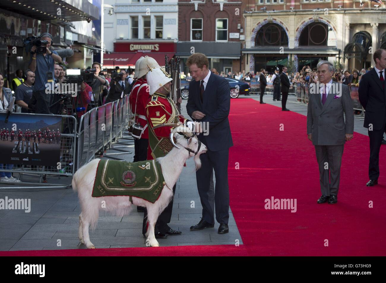 Prince Harry meets Sgt 'Jacko' Jackson, Goat Major, with Shenkin, the ...