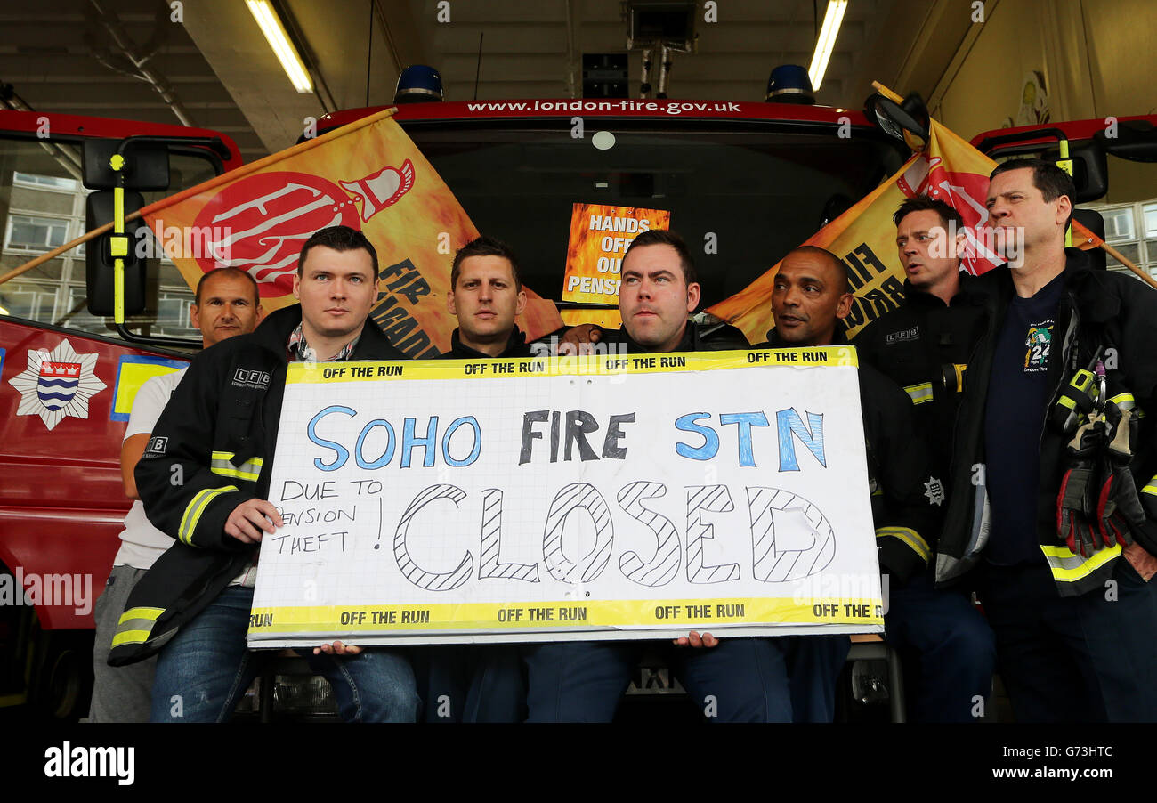 Firefighters outside Soho fire station in London, as members of the ...