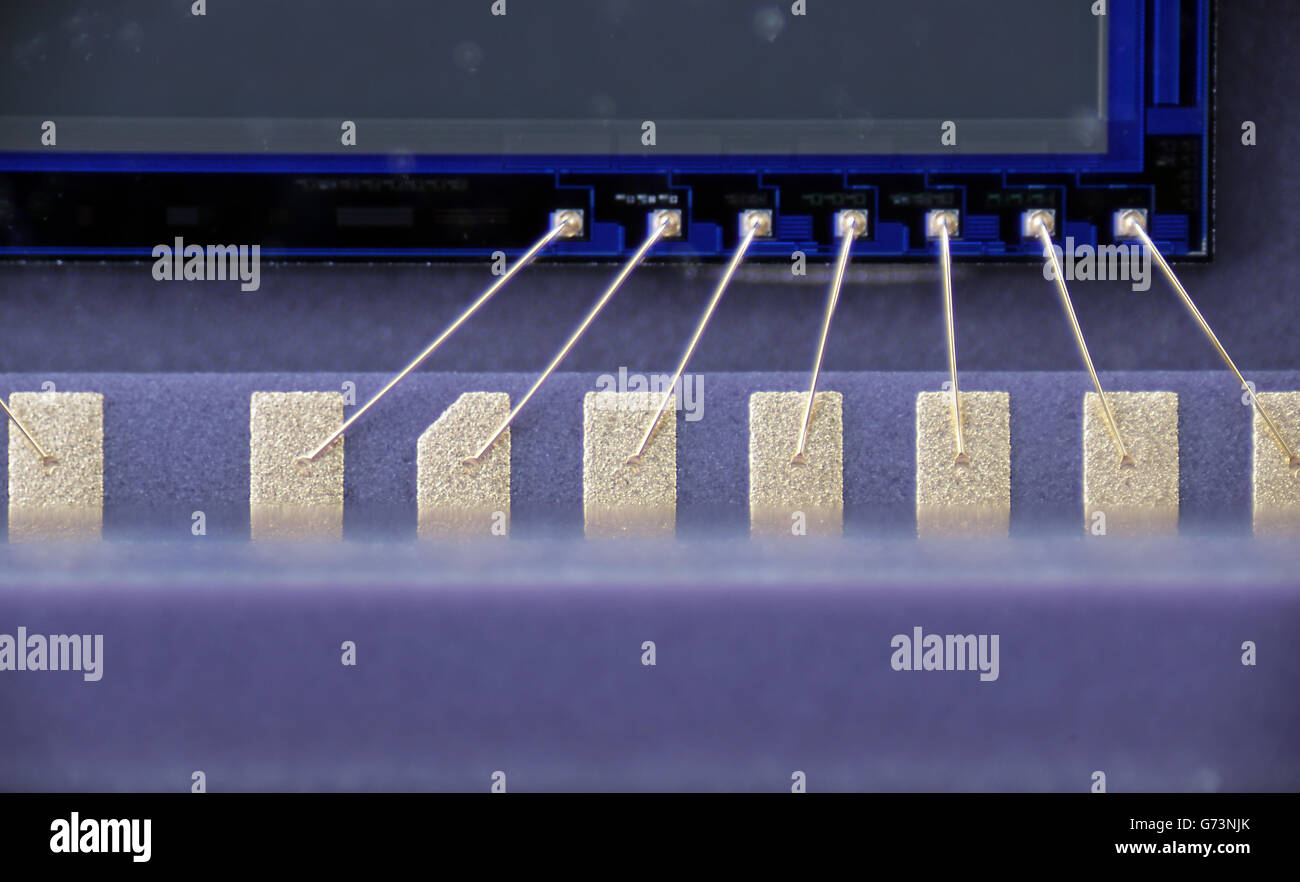 Macro photo of micro gold contacts are connecting matrix with PCB board ...