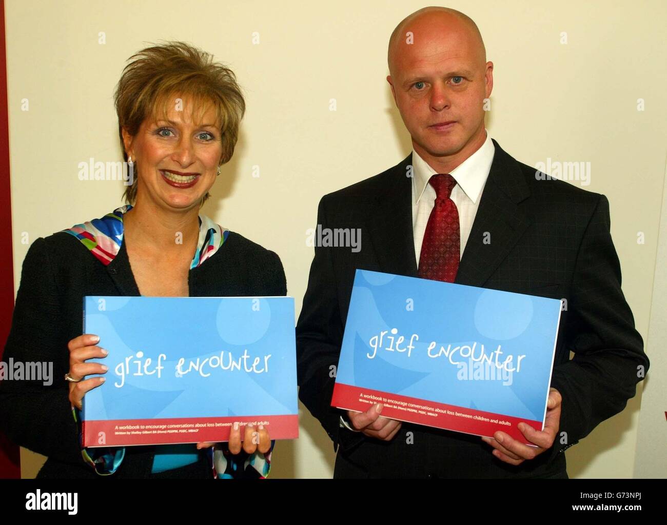 Kevin Wells helps launch a workbook written by Shelley Gilbert (left ...