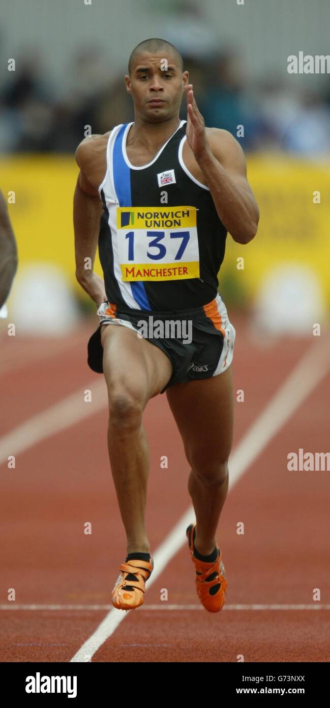 Jason Gardener competes in the 100 metres heats during day one of the ...