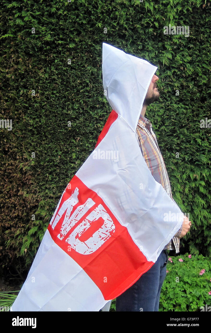 A man wears a "wearable England flag" made by Asda, as the supermarket ...