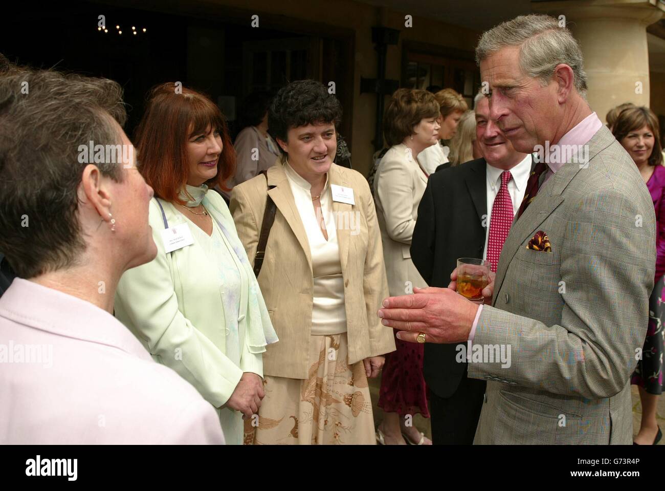 The Prince of Wales (right) speaks to (from left) Susan Palmer from ...