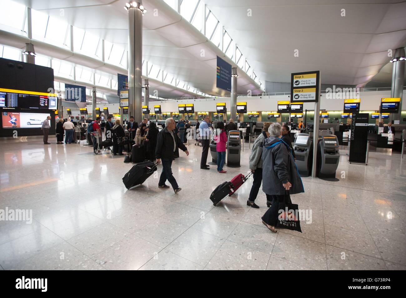 Terminal 2 opens at Heathrow airport. Passengers arrive at the new ...