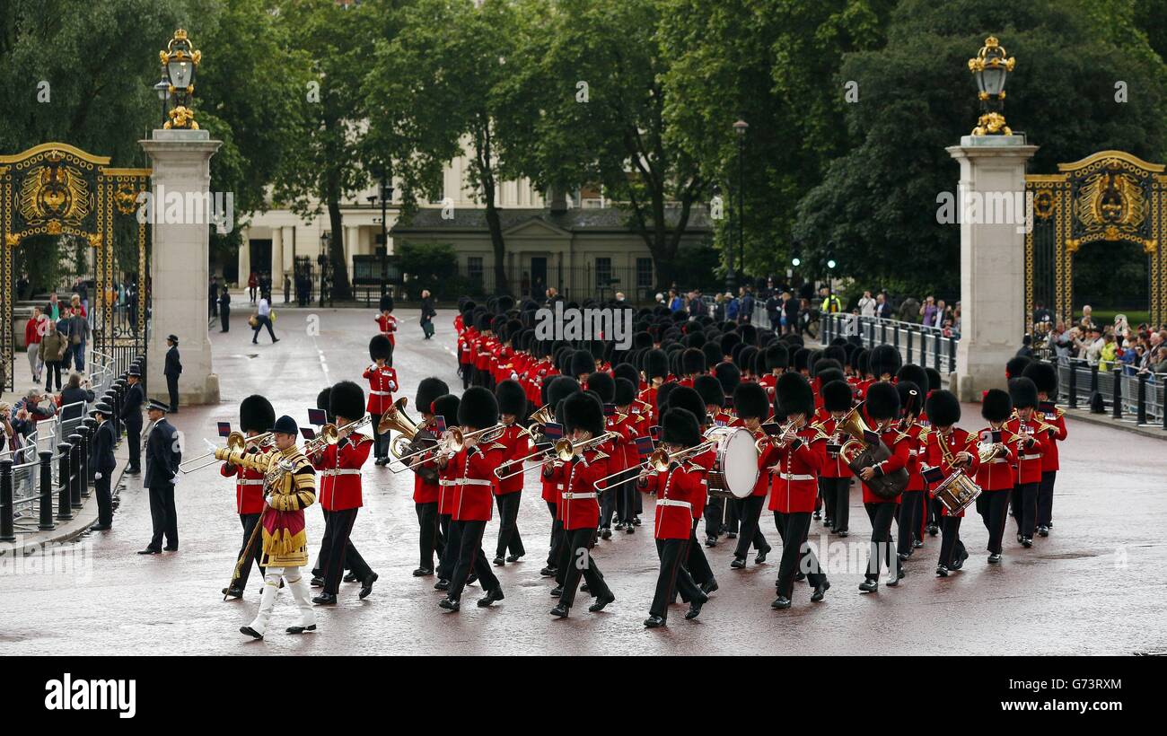 Members of the guard of honour process past buckingham palace hi-res ...