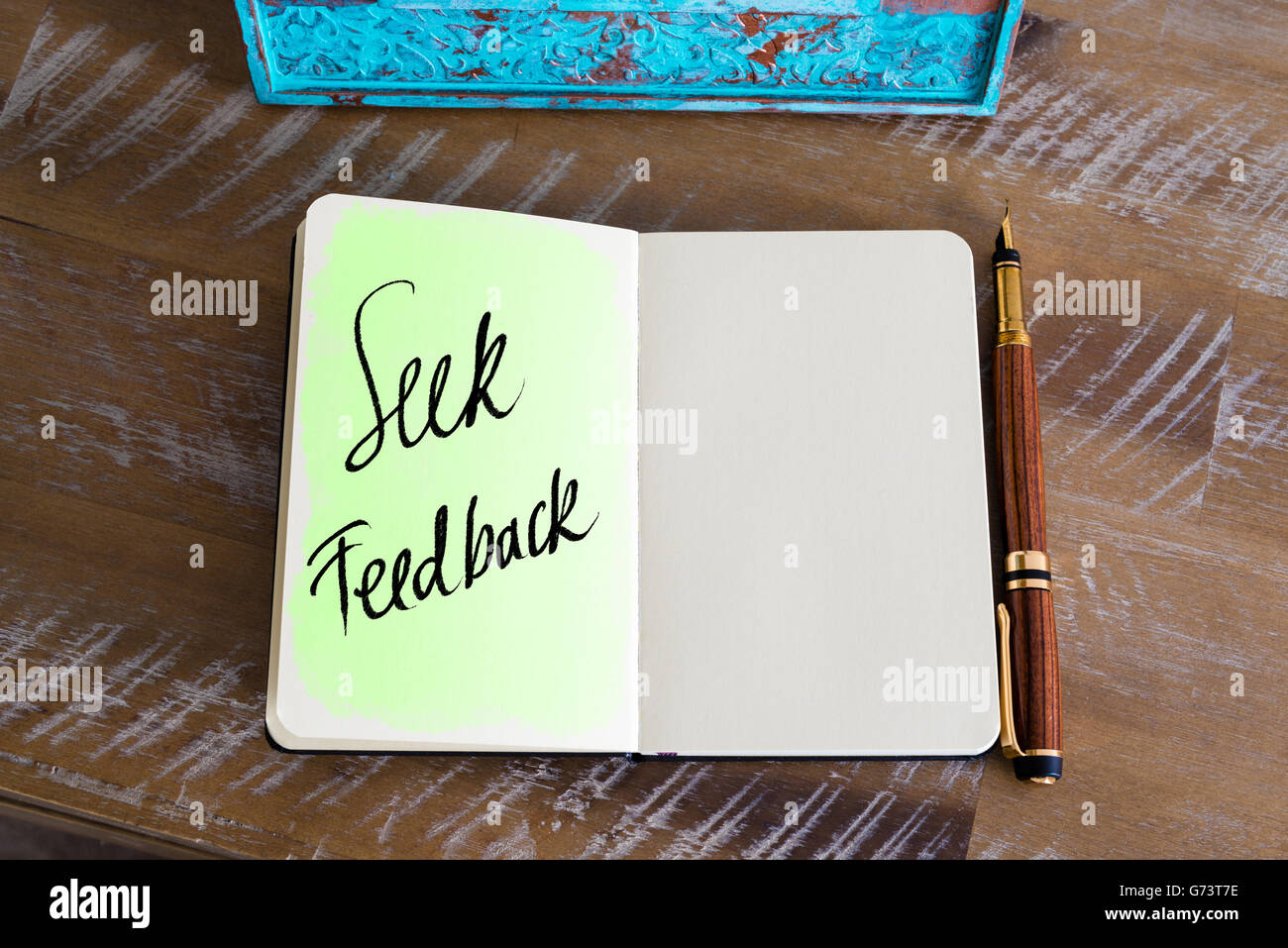Text Seek Feedback handwritten on notebook Stock Photo - Alamy