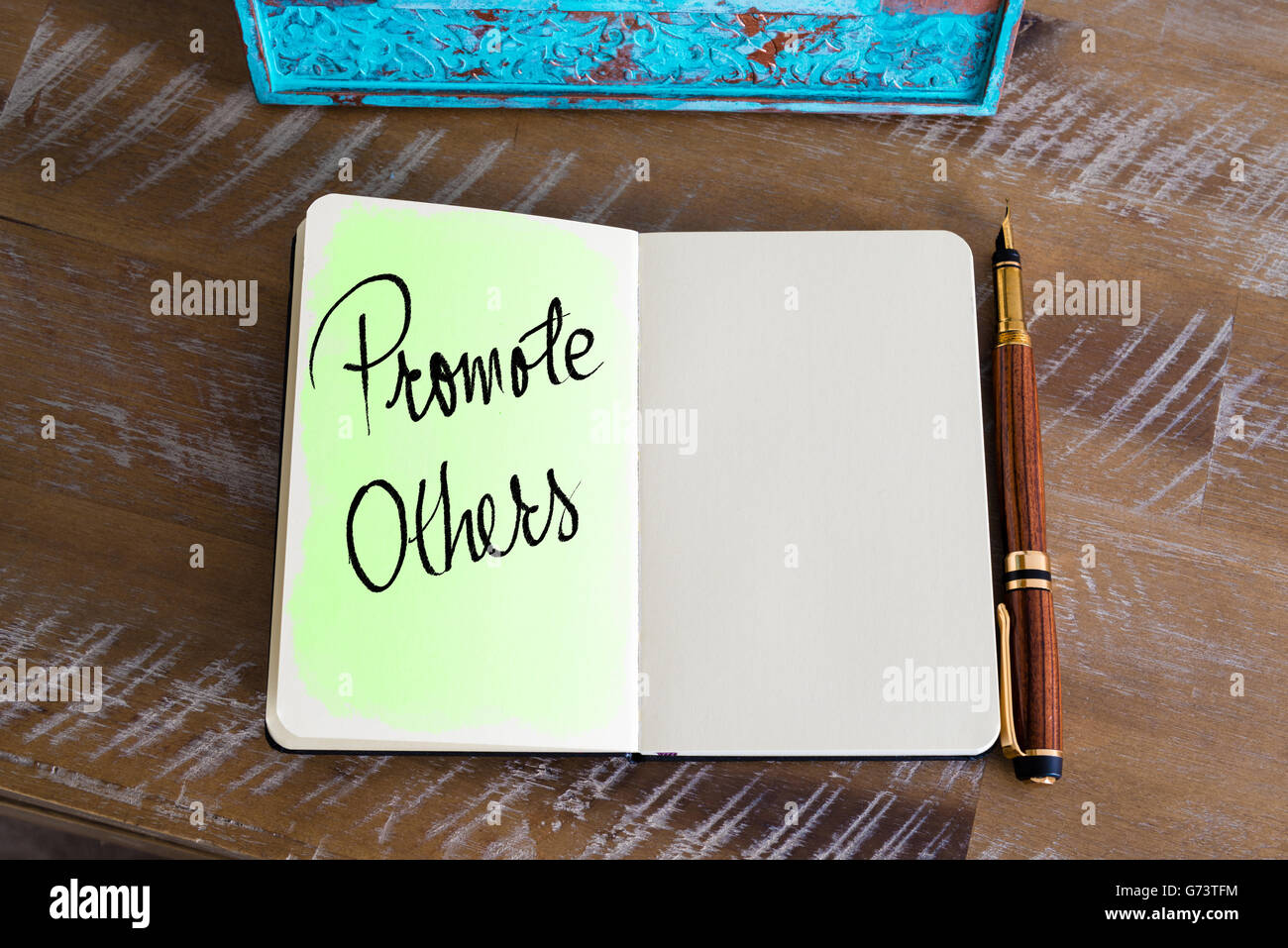 Handwritten Text Promote Others Stock Photo - Alamy