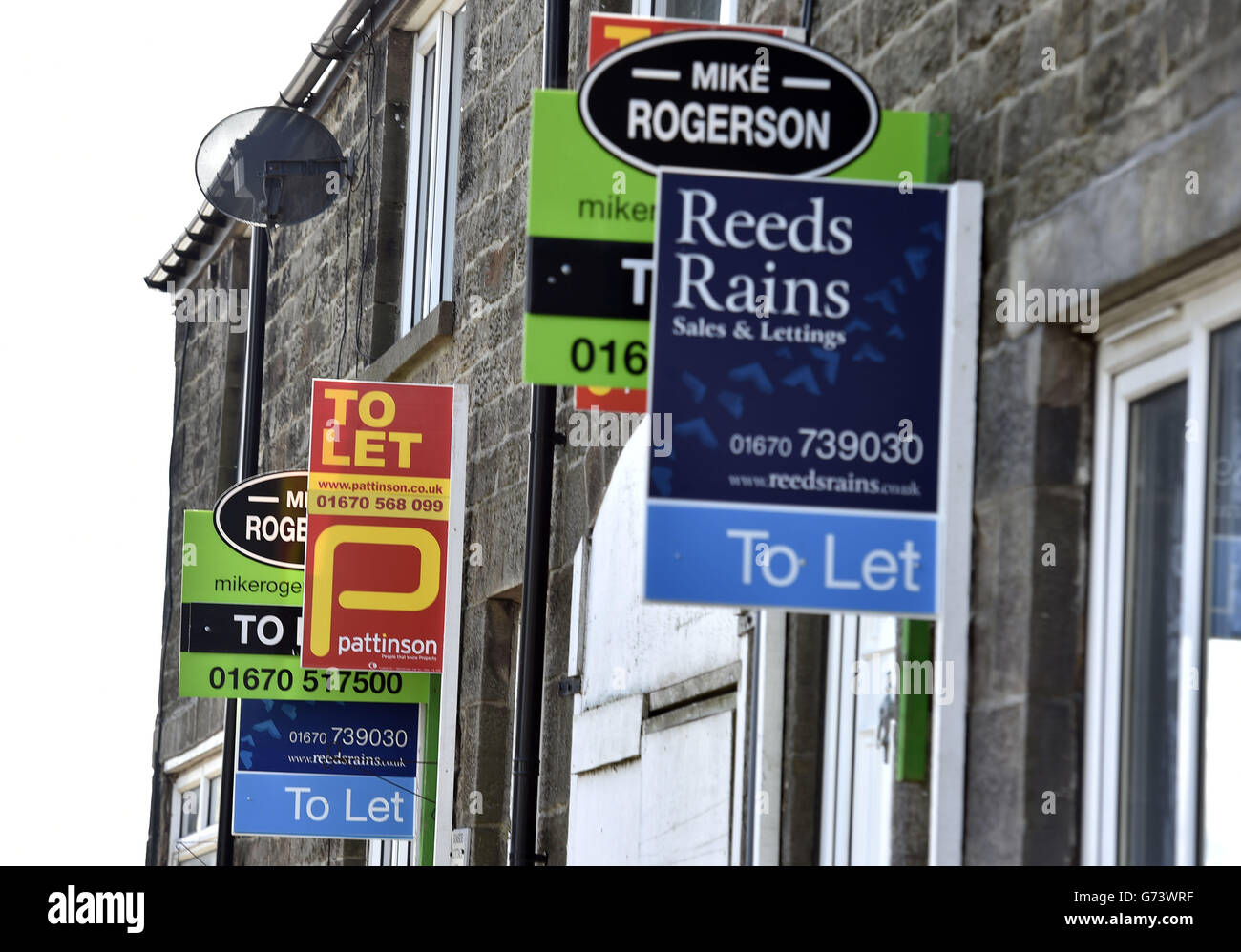 General view of Estate Agent's 'To let' signs on a street in ...
