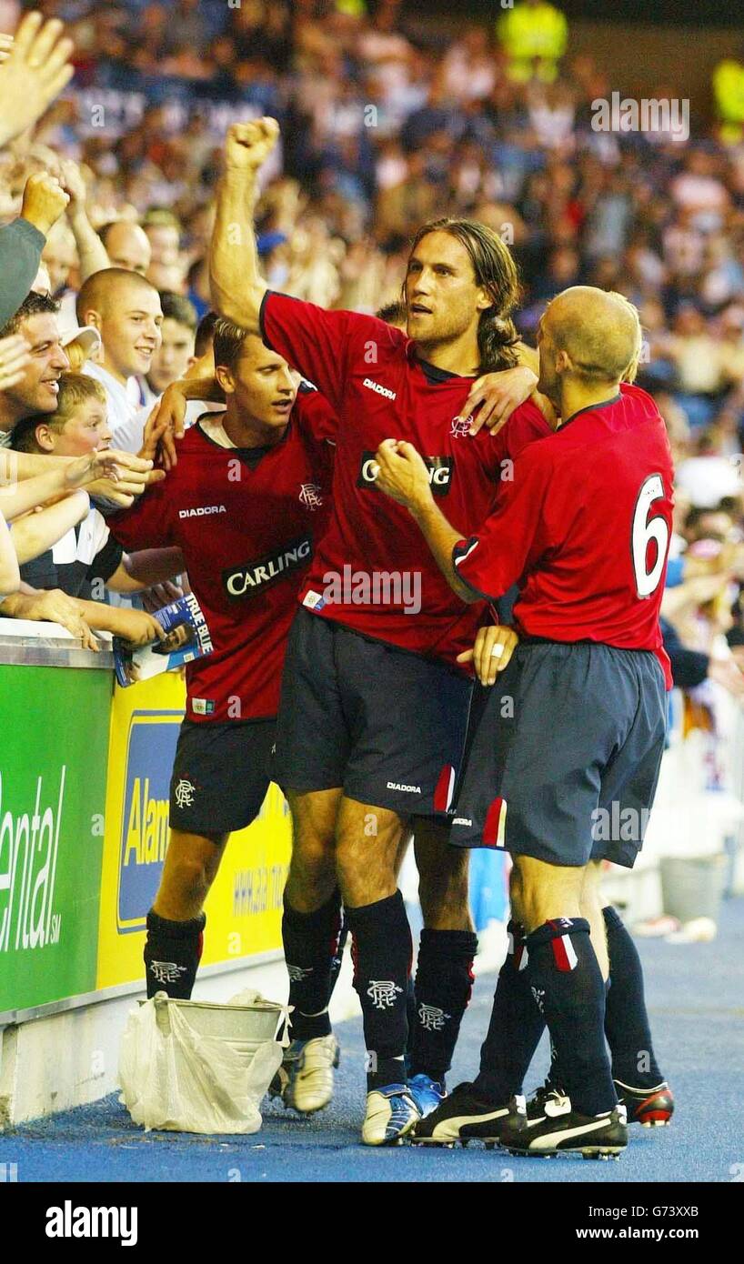 Rangers' Dado Prso (centre) celebrates scoring the second goal with ...