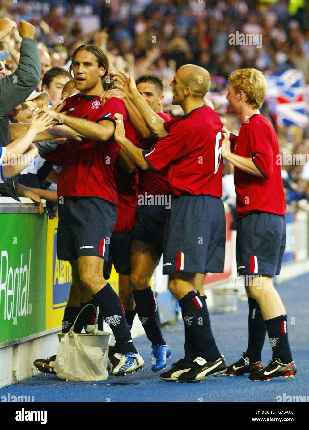 Rangers' Dado Prso (left) celebrates scoring the second goal with team ...