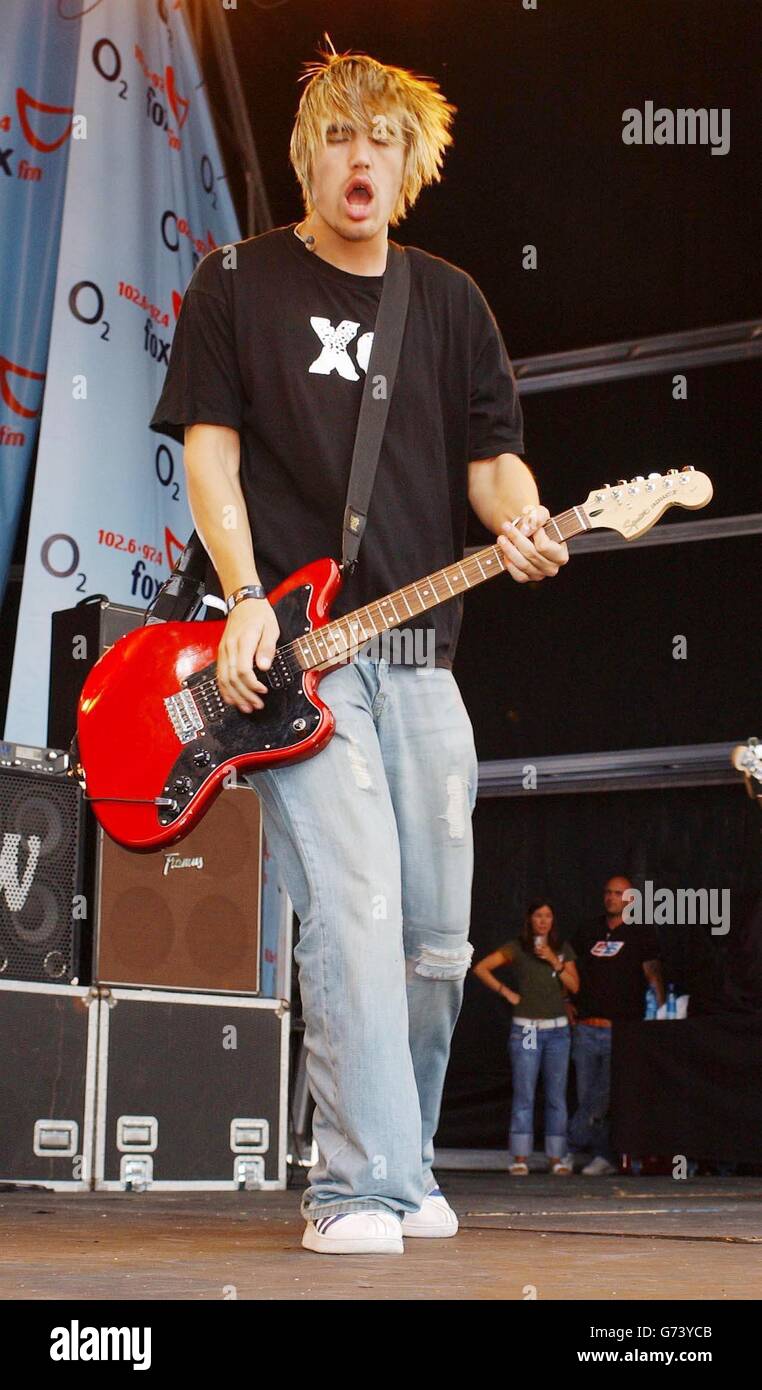 Charlie Simpson from pop group Busted performing on stage at the Fox FM ...