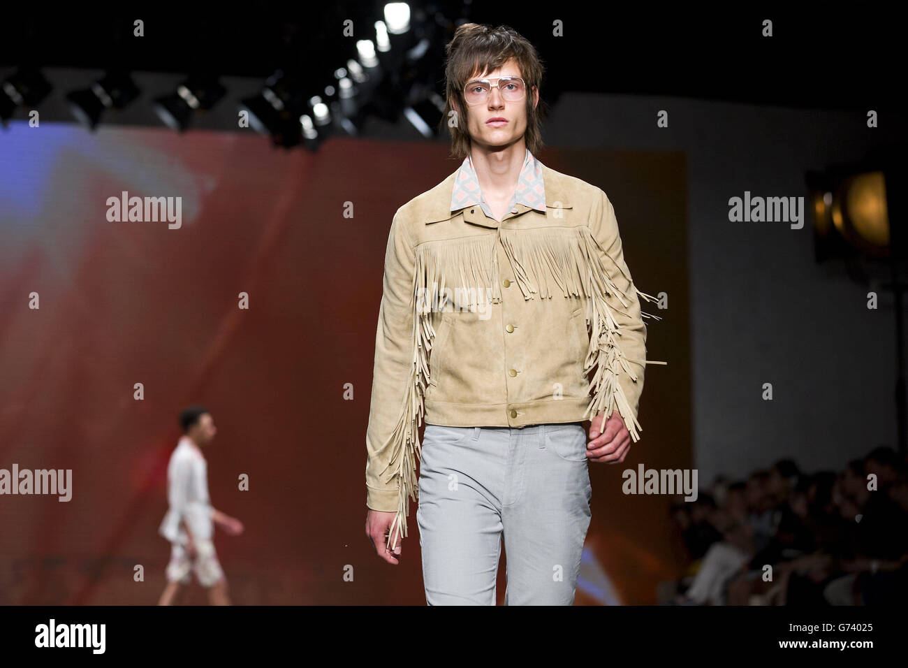 A model wears a design in the Topshop catwalk show during London ...