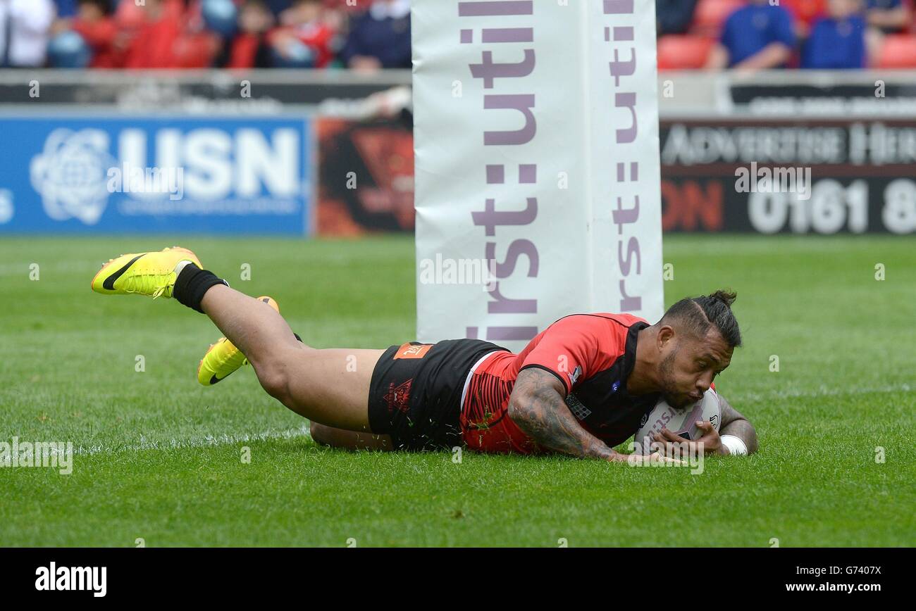 Salford Red Devils' Junior Sa'u goes over for his third try against ...