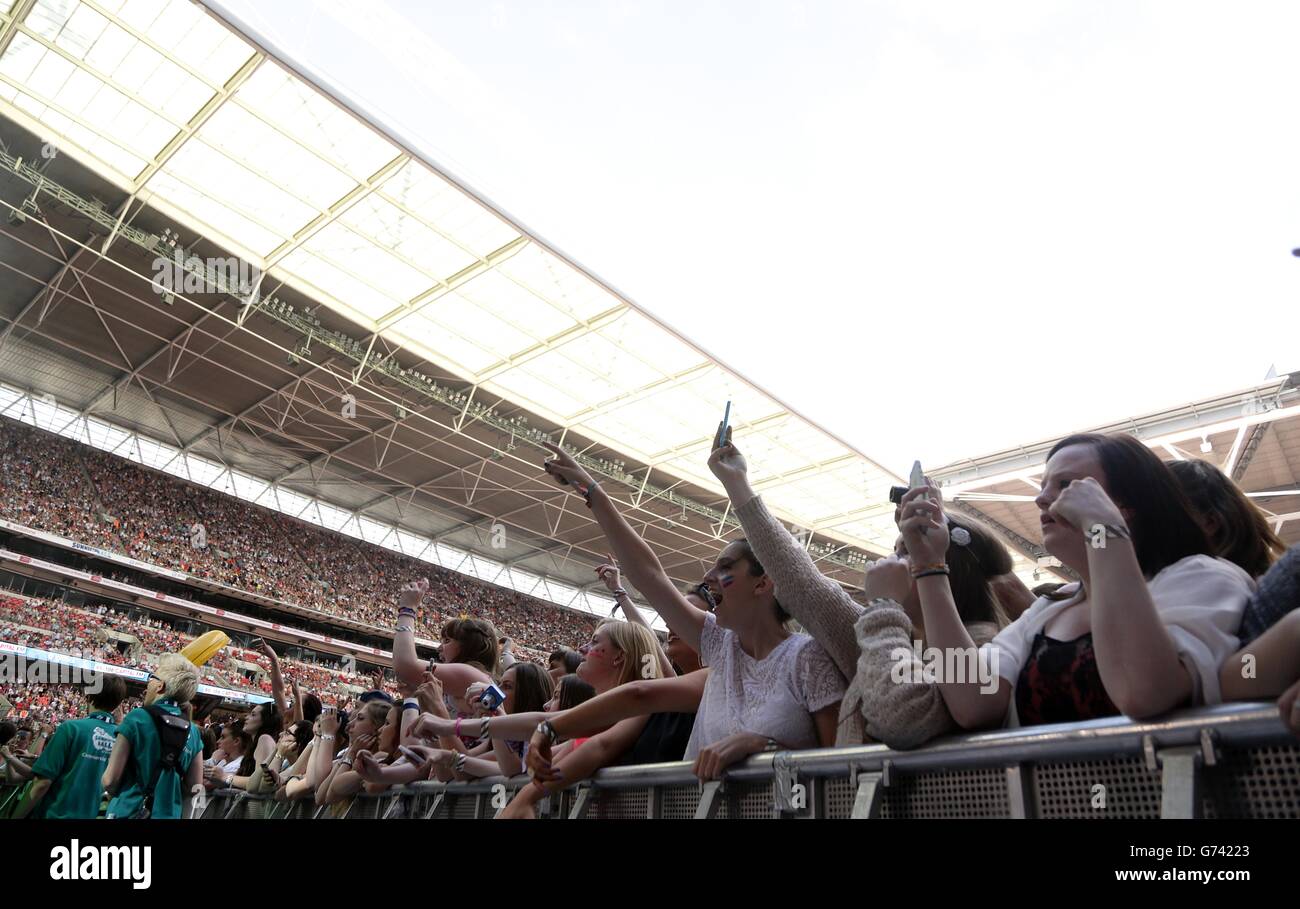 Crowd members sing along during 5 Seconds of Summer during Capital FM's ...