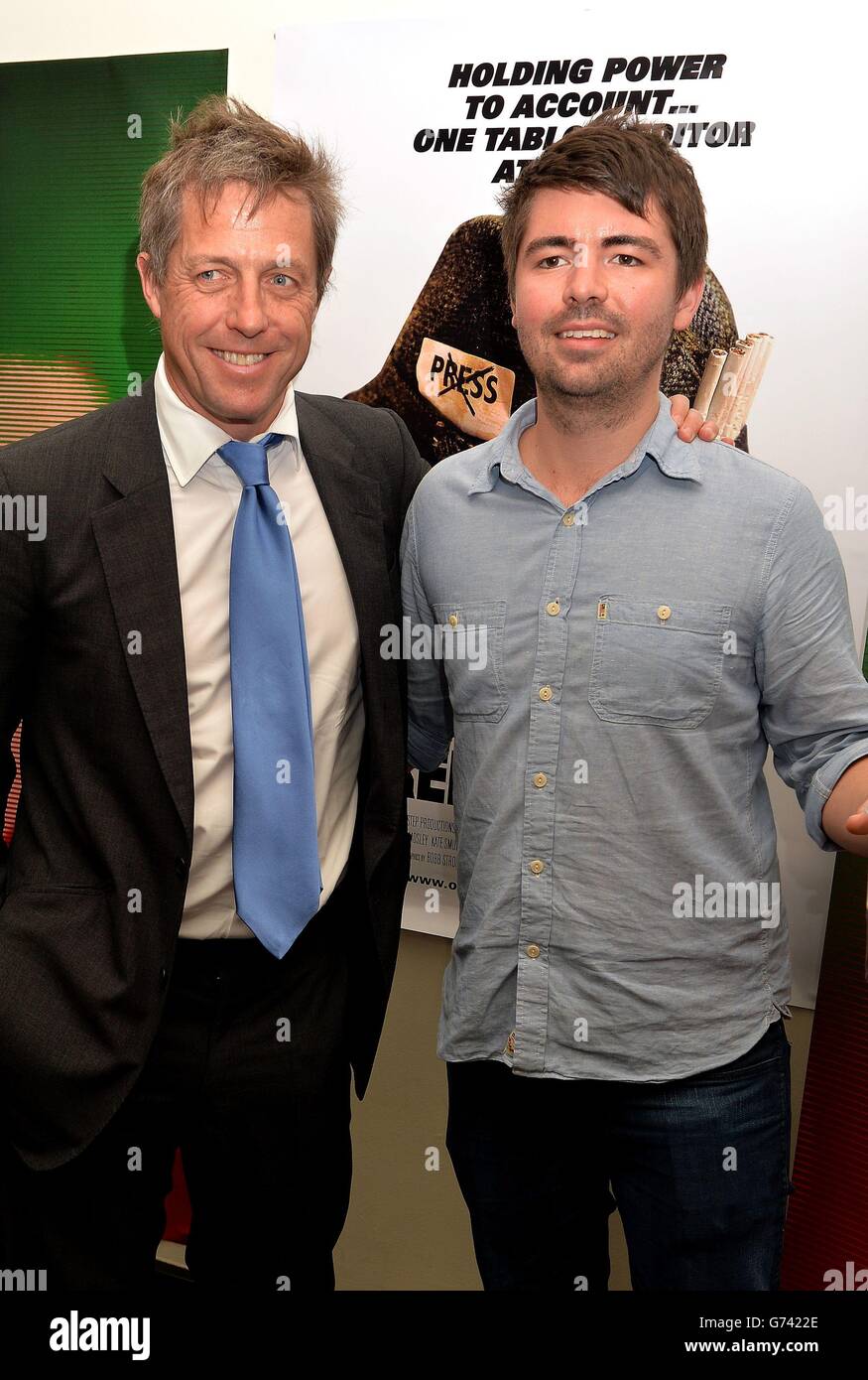 Hugh Grant with director Rich Peppiatt attending the screening of One ...