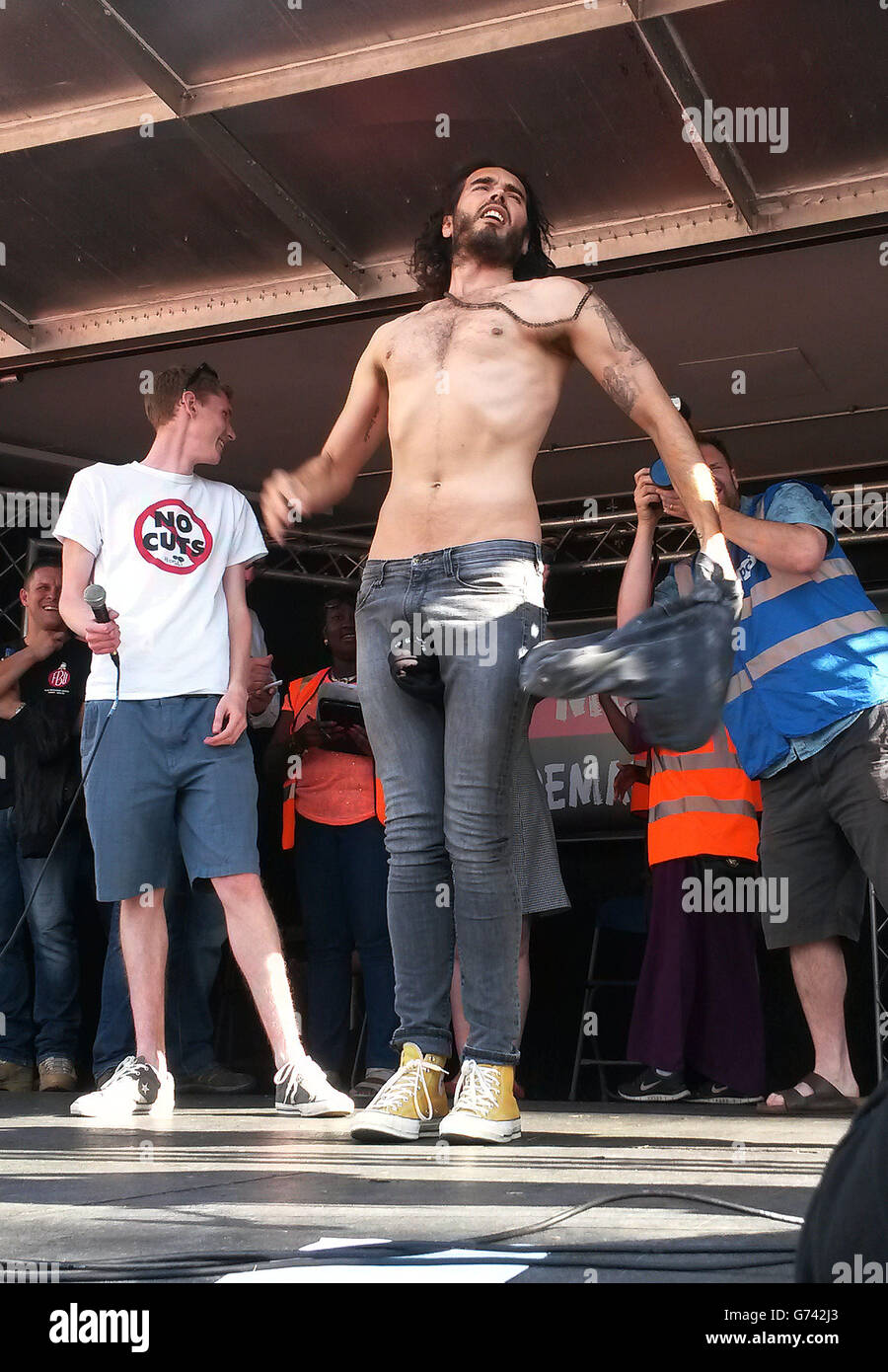 Comedian Russell Brand as he called on thousands of protesters to be ...