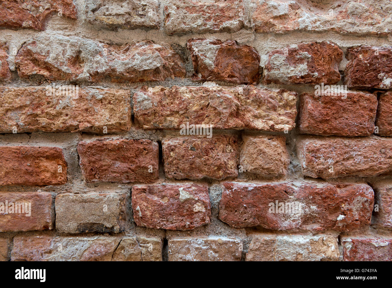 Old terracotta red brick wall hi-res stock photography and images - Alamy