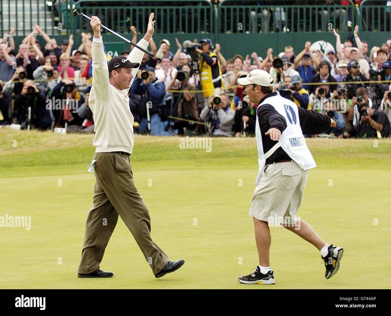 USA's Todd Hamilton celebrates with caddy Ron Levin (right) after ...