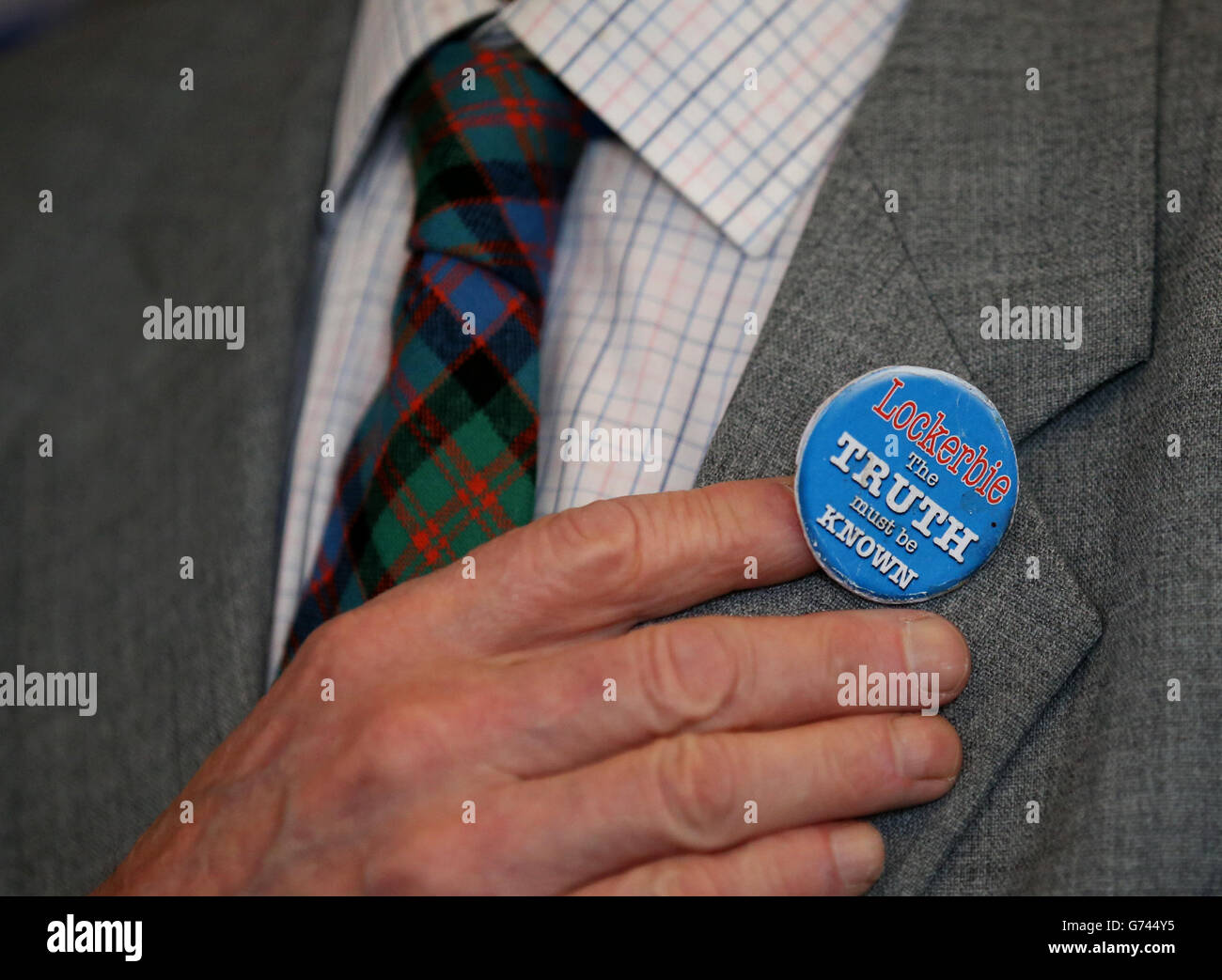 A badge worn by Dr Jim Swire, the father of Flora Swire who died in the ...