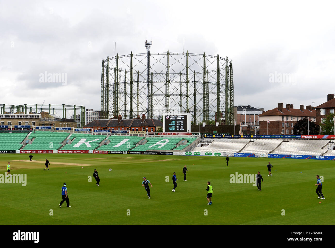 Surrey players play football prior to the start of play on day three ...