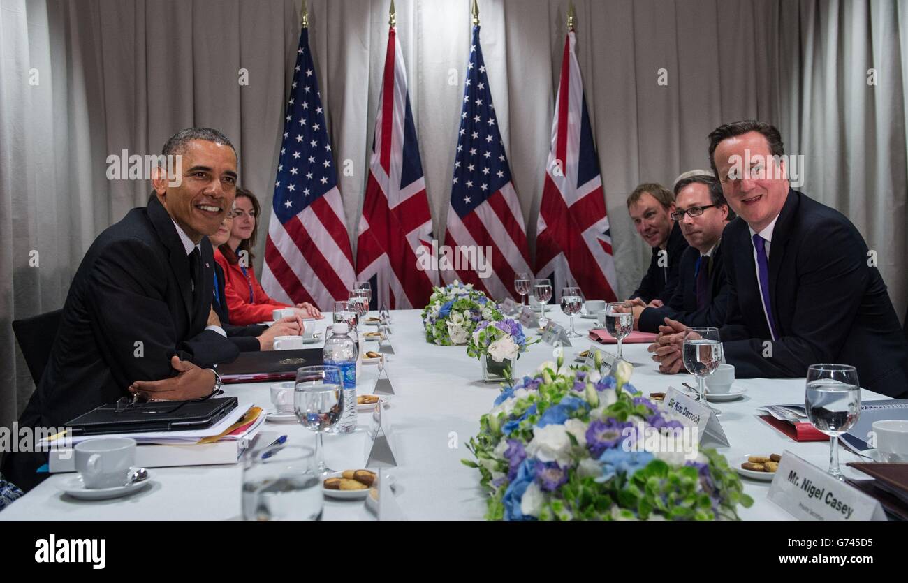 British Prime Minister David Cameron (right) holds a bilateral meeting ...