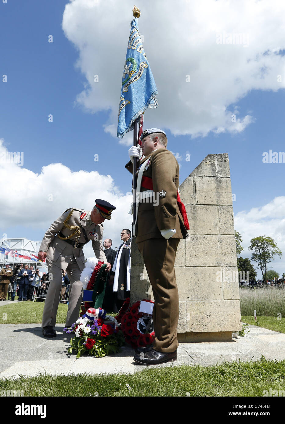 The Prince of Wales places a commemorative wreath at the foot of the ...