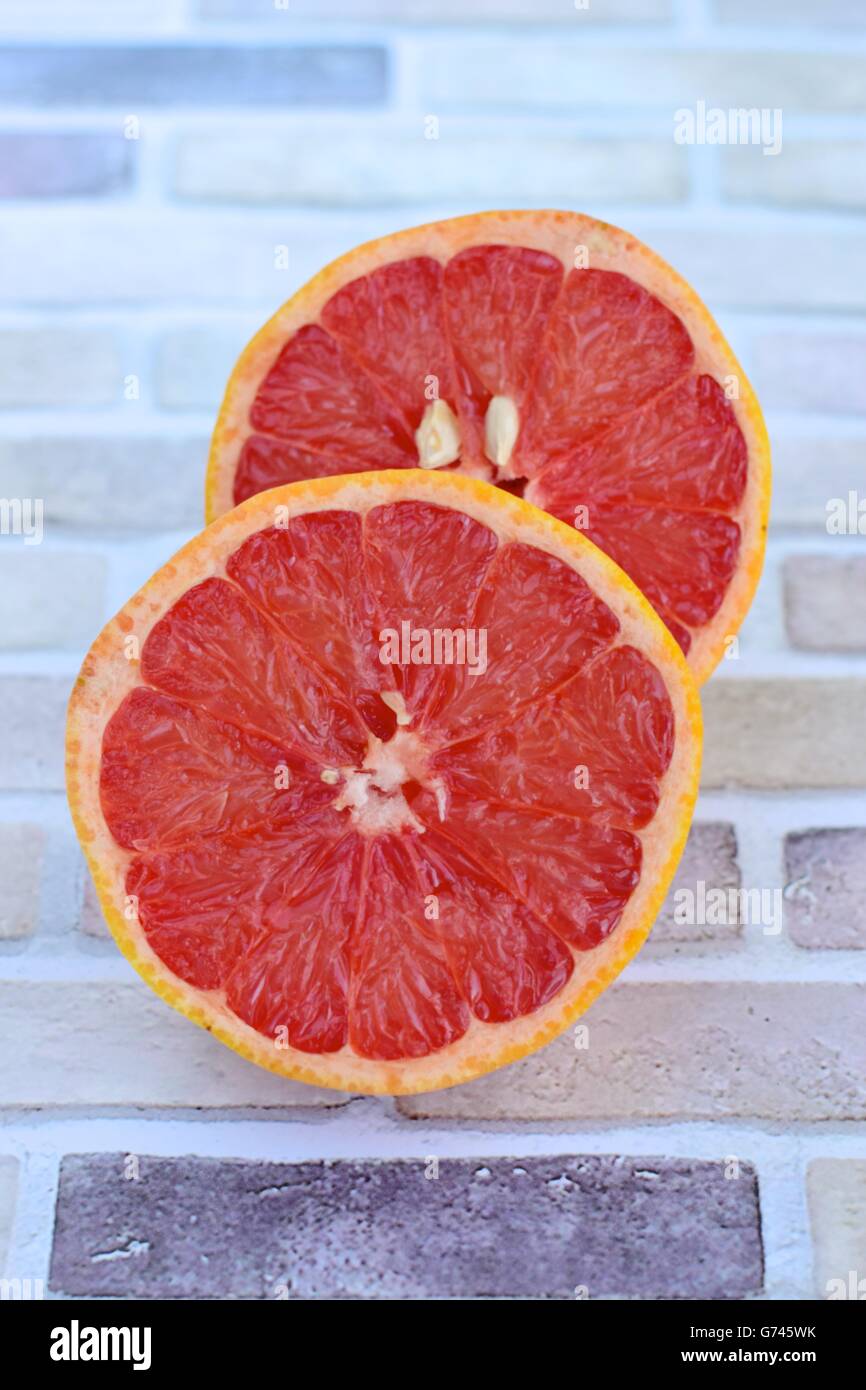 Slice of grapefruit Stock Photo - Alamy