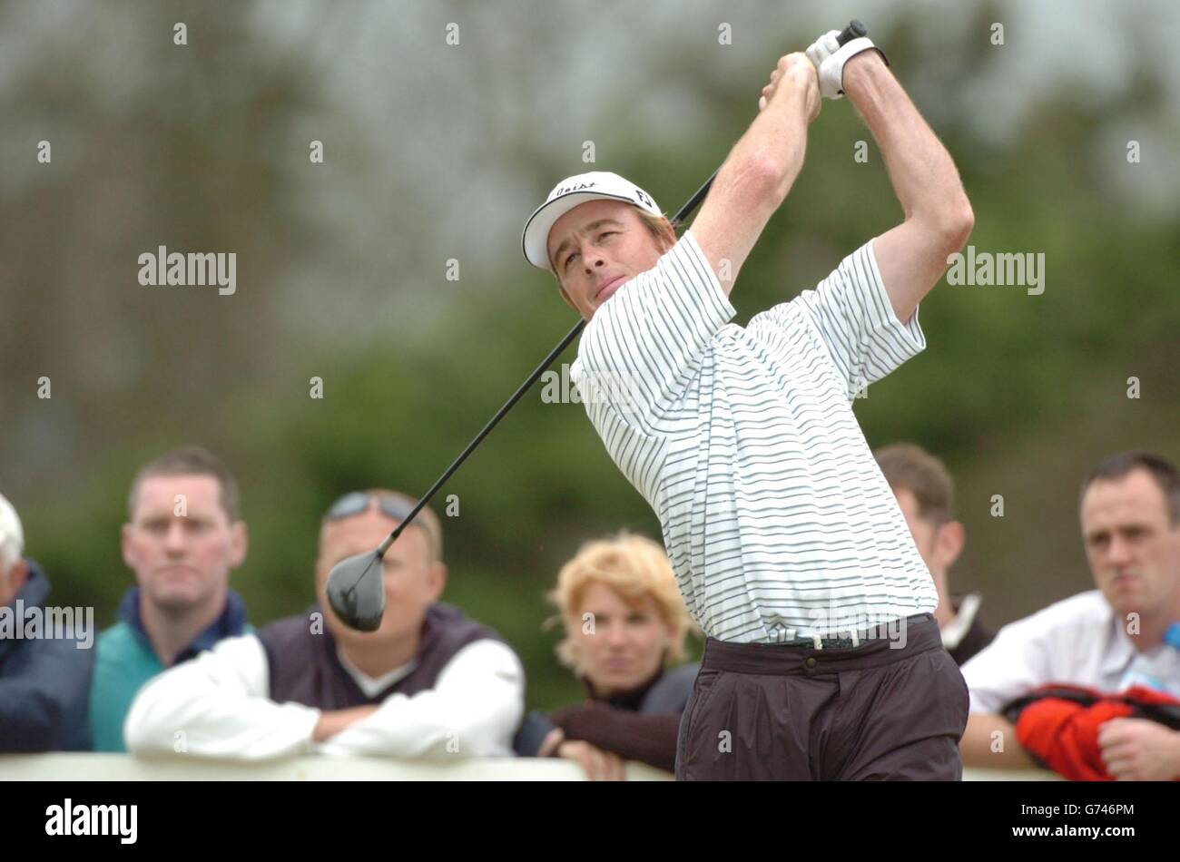 Australia's Brett Rumford, plays his tee shot at the fourth, in the ...