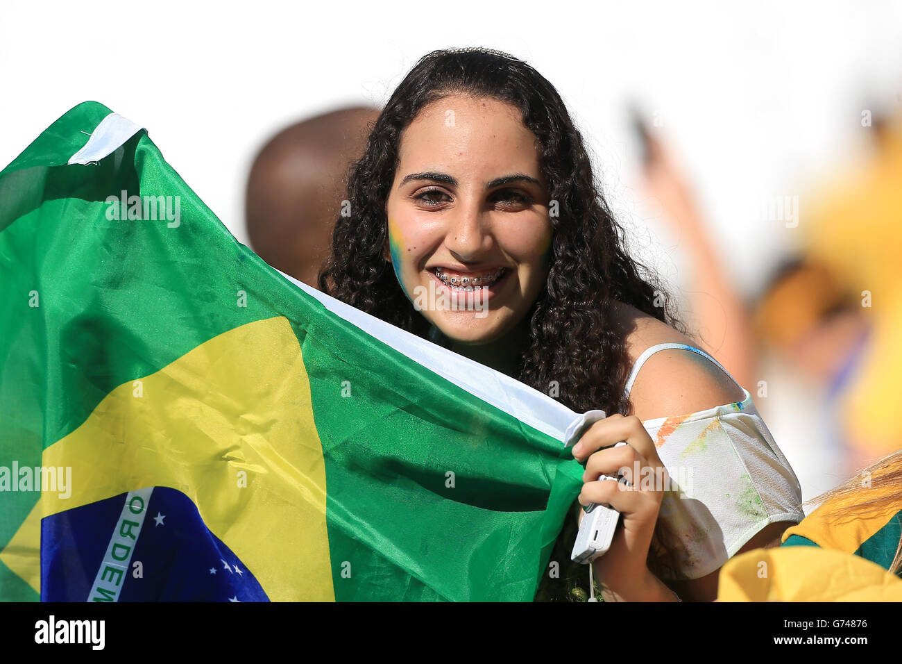 A Brazil fan soaks up the atmosphere at the Arena Corinthians Stock ...
