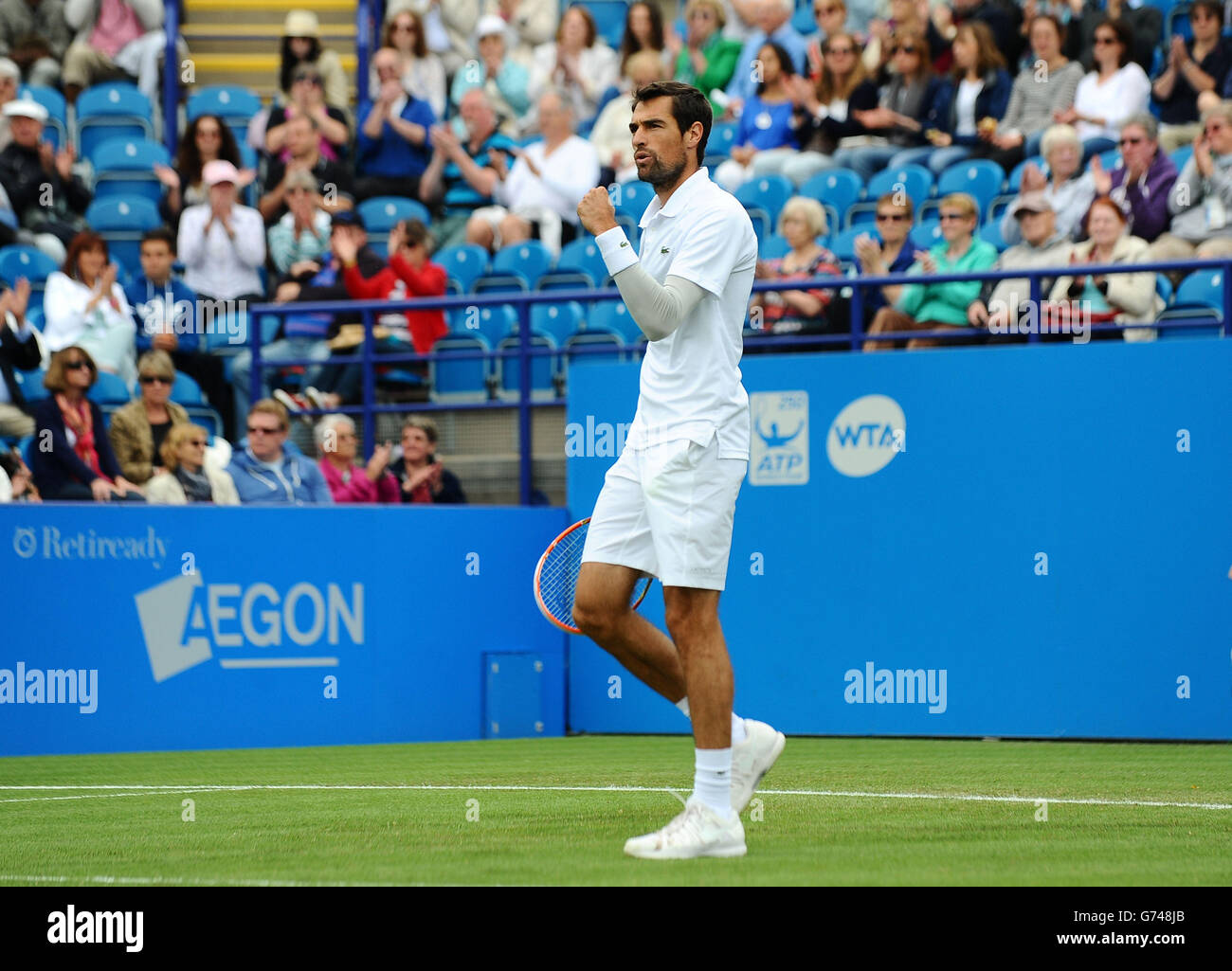 Jeremy Chardy celebrates his win over Ivo Karlovic during the AEGON ...