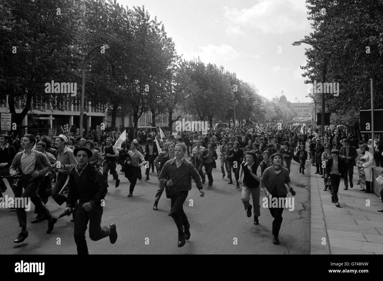Liverpool and Arsenal fans race along Olympic Way, three hours before ...