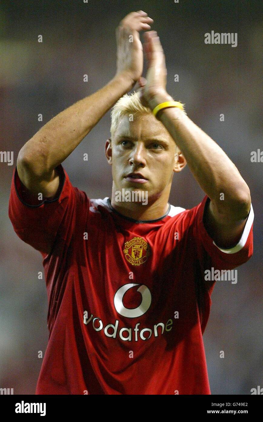 New signing Alan Smith salutes the fans after his first match for ...
