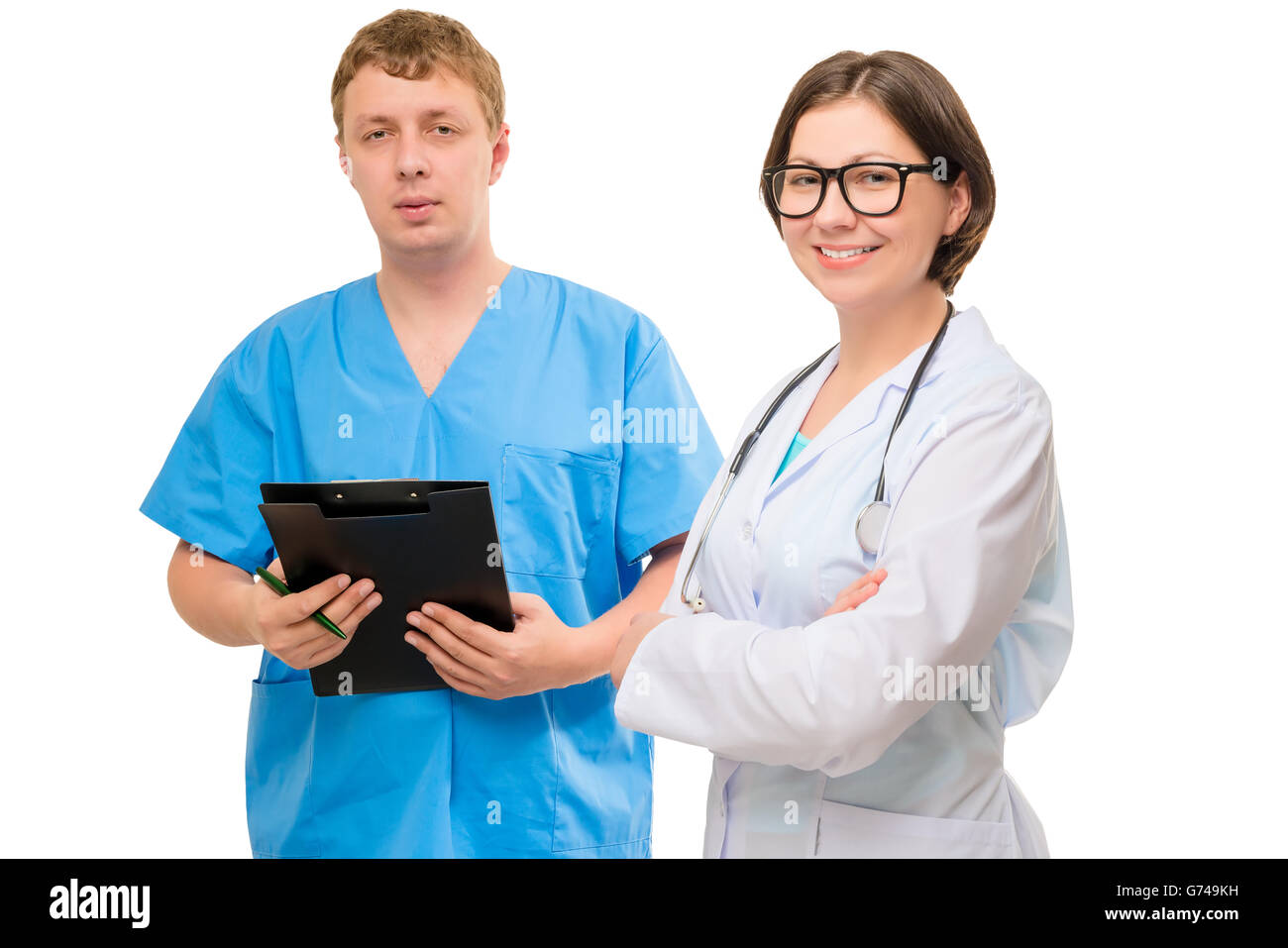 Doctor couple posing in a studio on a white background Stock Photo - Alamy
