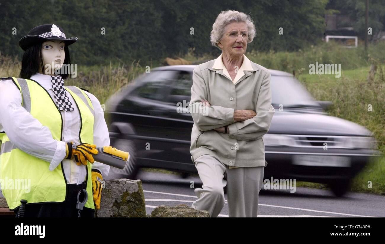 Scarecrow with speed camera hi-res stock photography and images - Alamy
