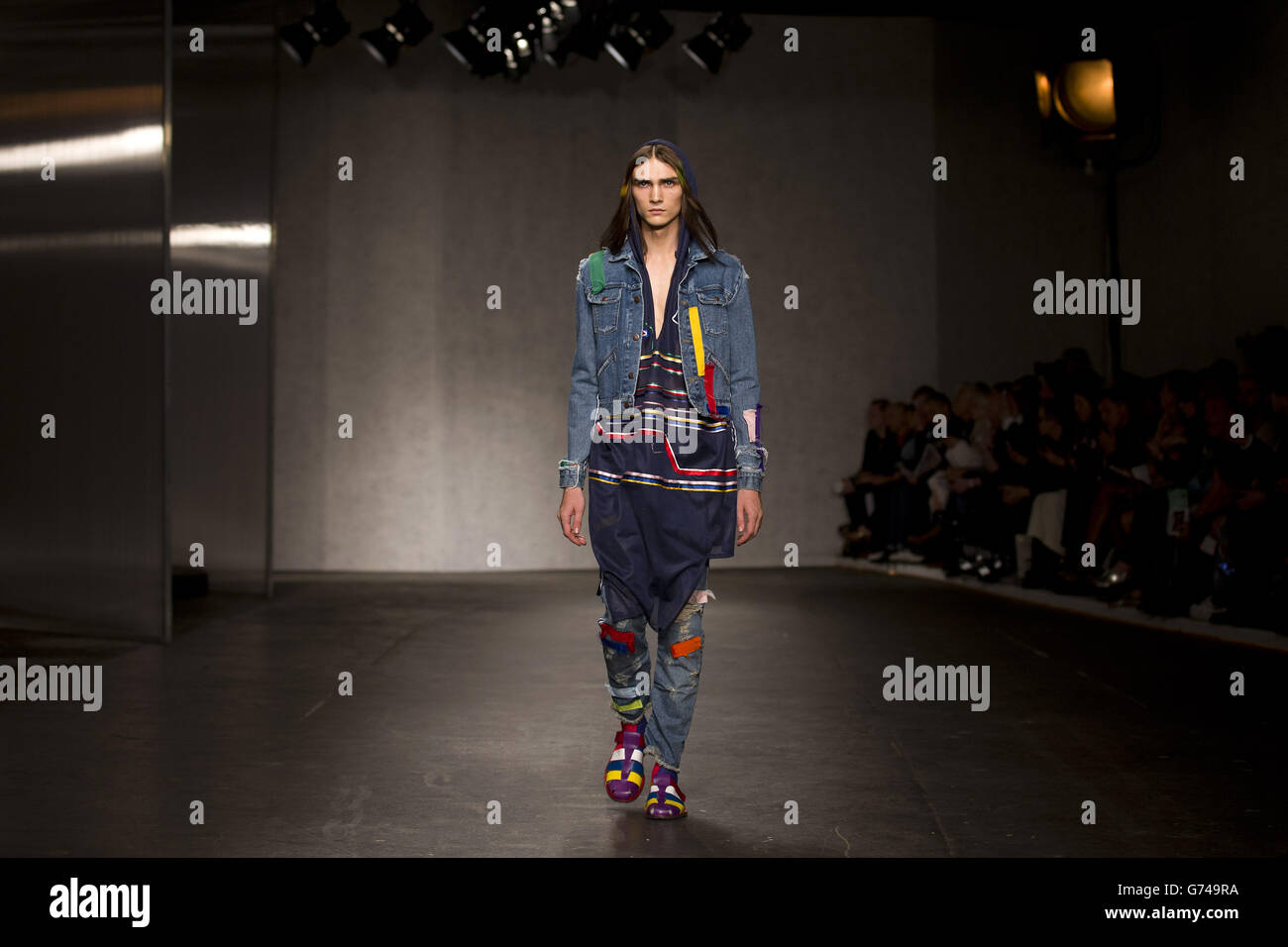 James Long catwalk - London Collections: Men 2014. A model appears on ...