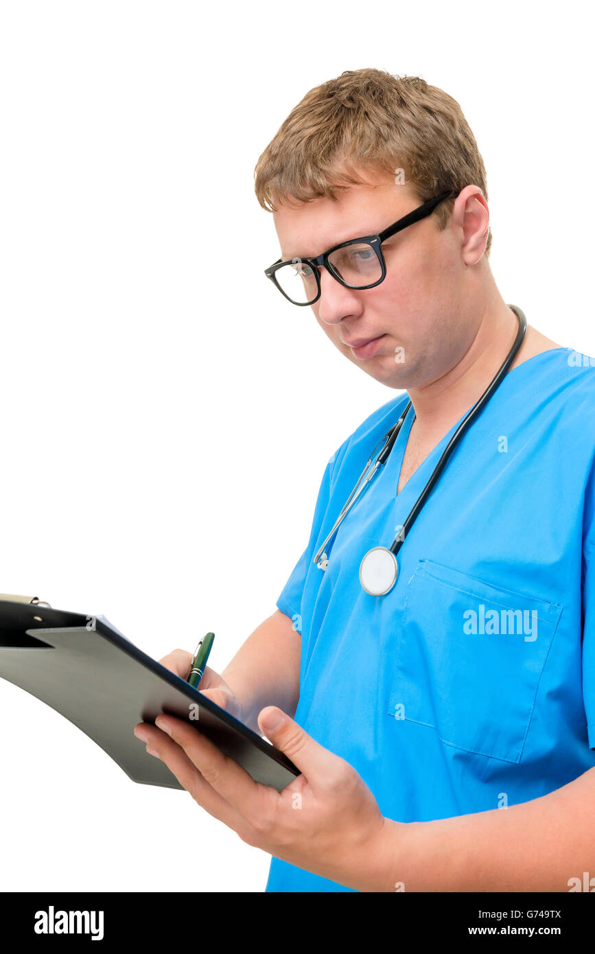 The doctor writes the results of surveys in a folder on a white ...