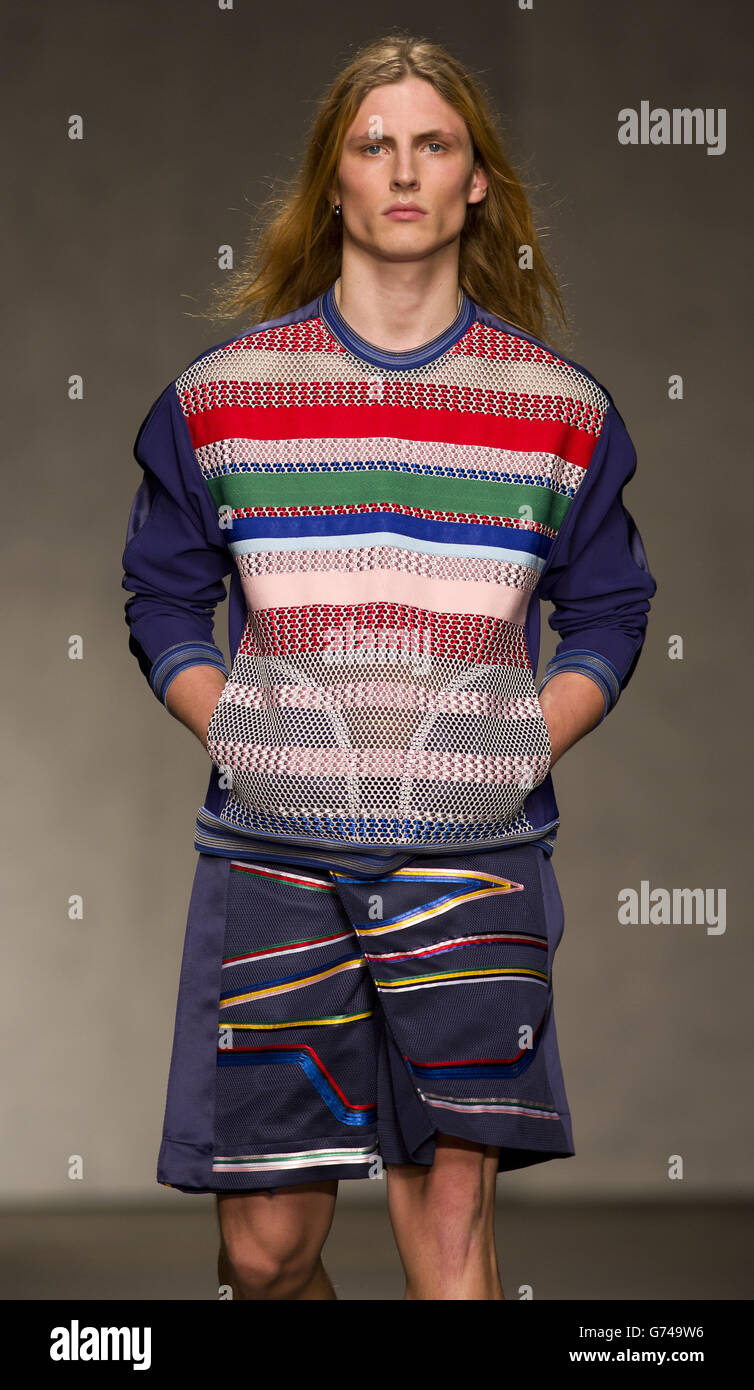 James Long catwalk - London Collections: Men 2014. A model appears on ...