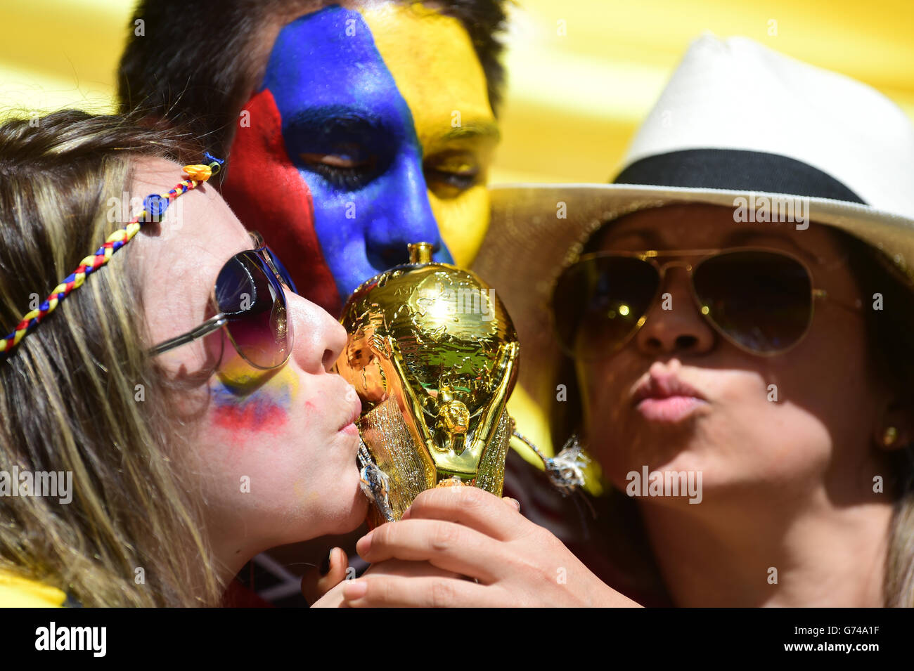 Columbia fans kiss replica world cup trophy kick off hi-res stock ...