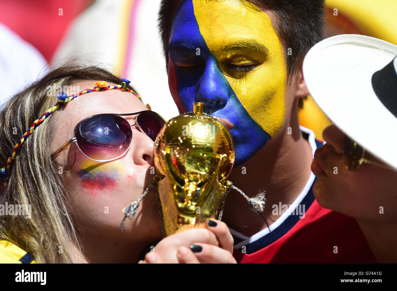Columbia fans kiss replica world cup trophy kick off hi-res stock ...