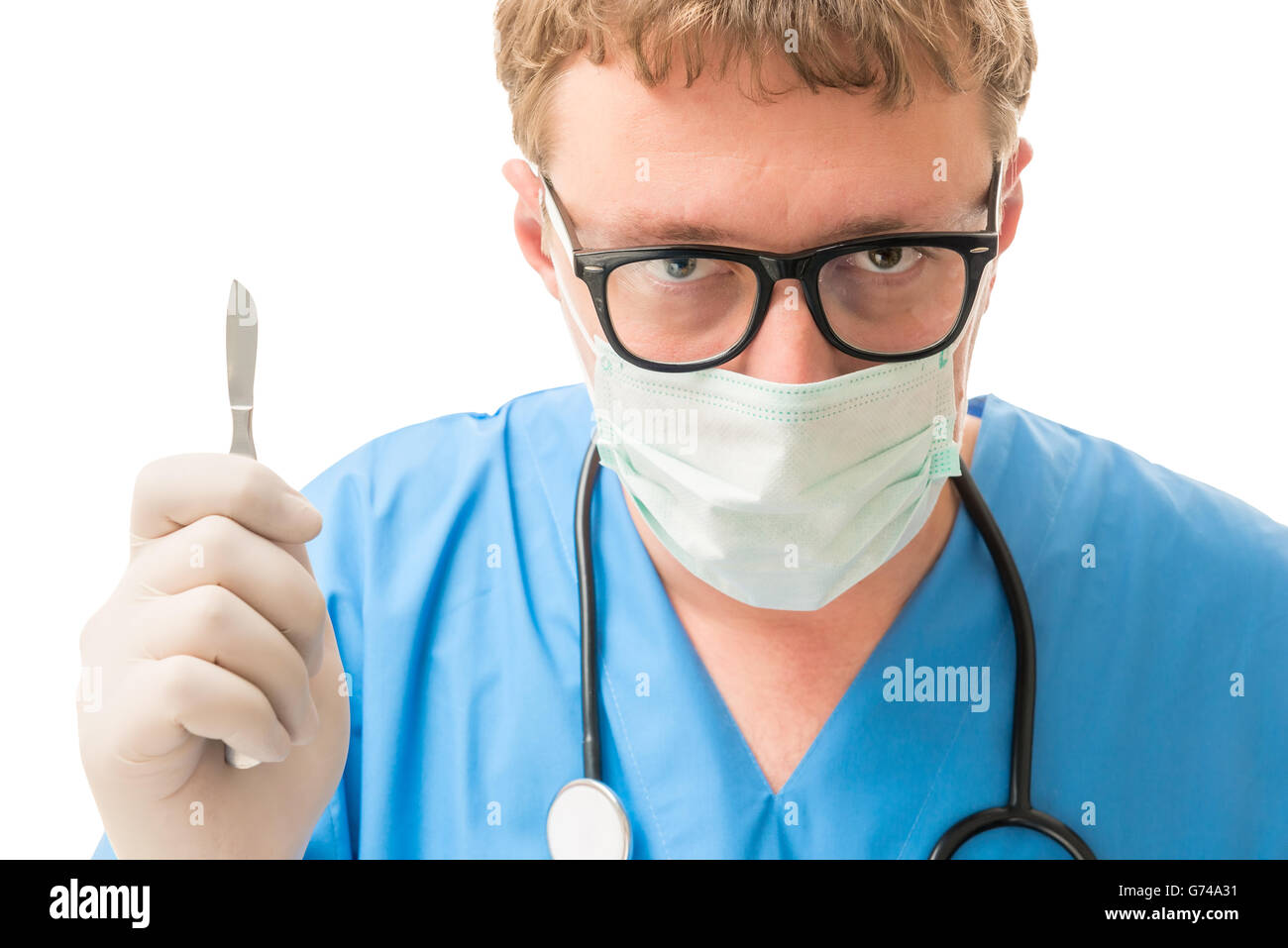 male surgeon holding a scalpel on a white background Stock Photo - Alamy