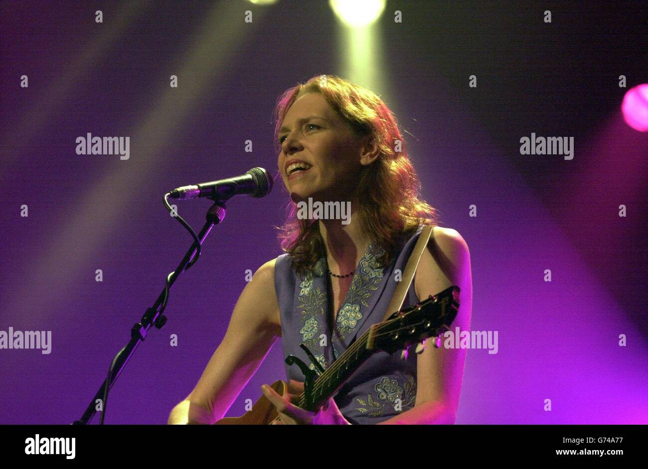 Singer Gillian Welch performing on stage at the 40th Cambridge Folk ...