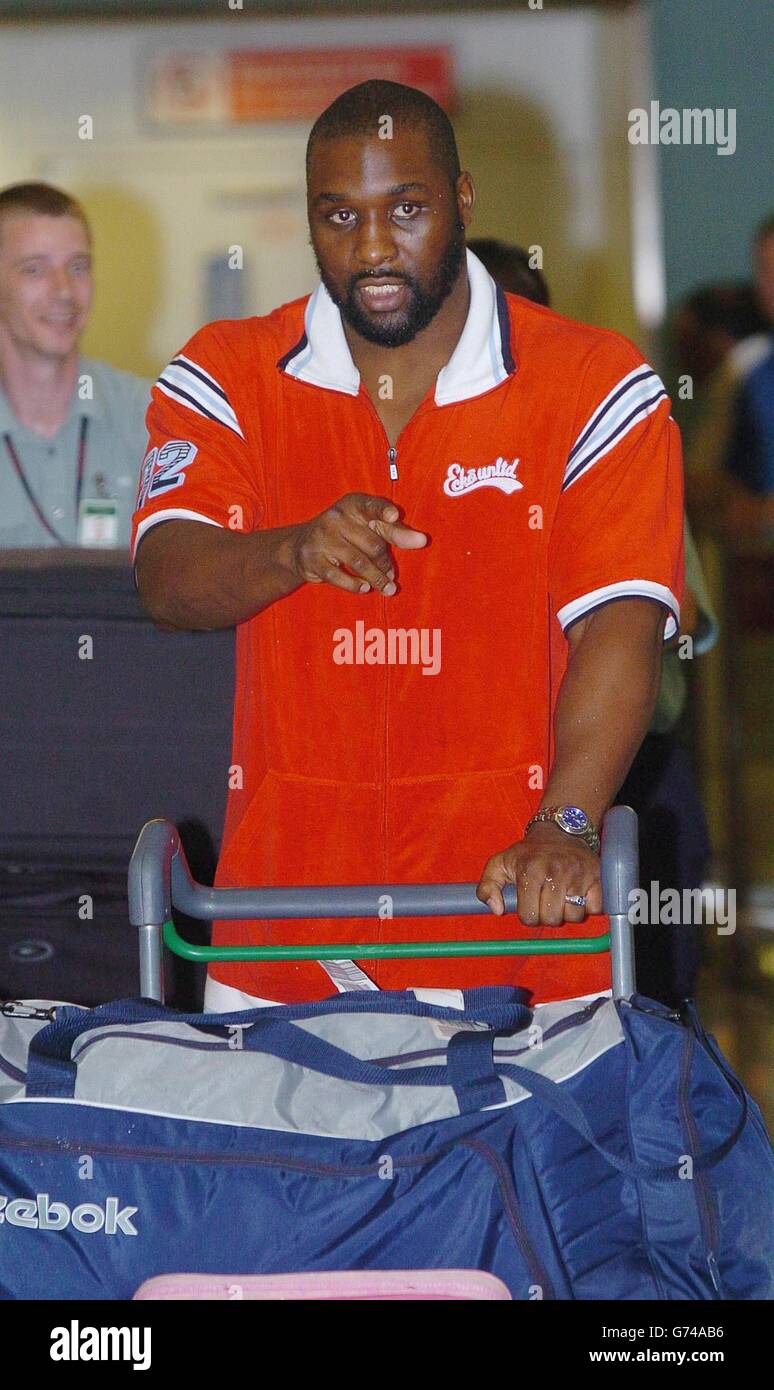 Boxer Danny Williams arrives back from New York at London's Heathrow ...