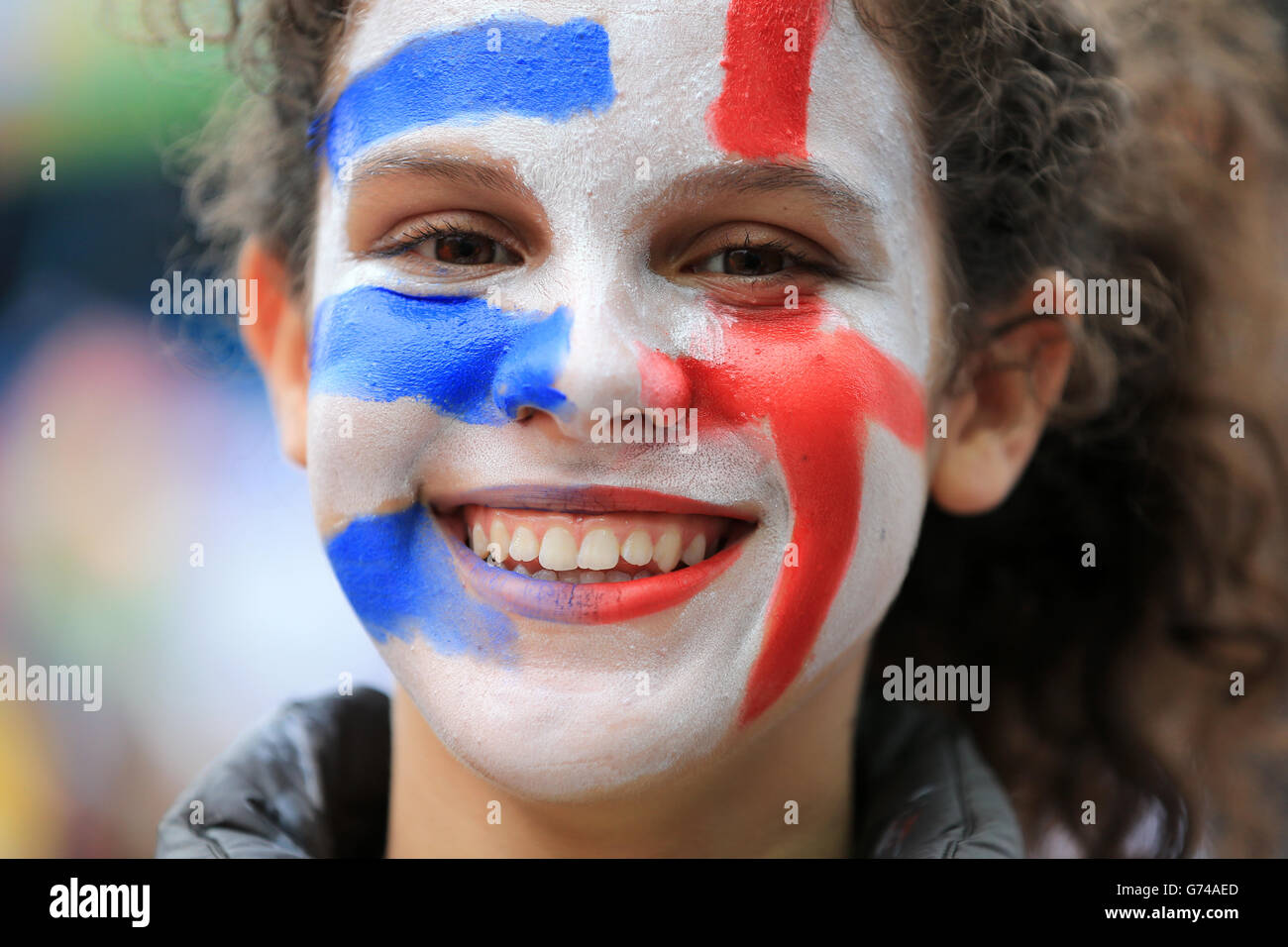 A young fan with her face painted before the Group D match the Estadio ...