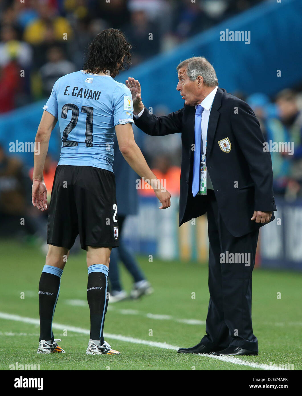 Uruguay manager Oscar Tabarez speaks with Edinson Cavani during the ...