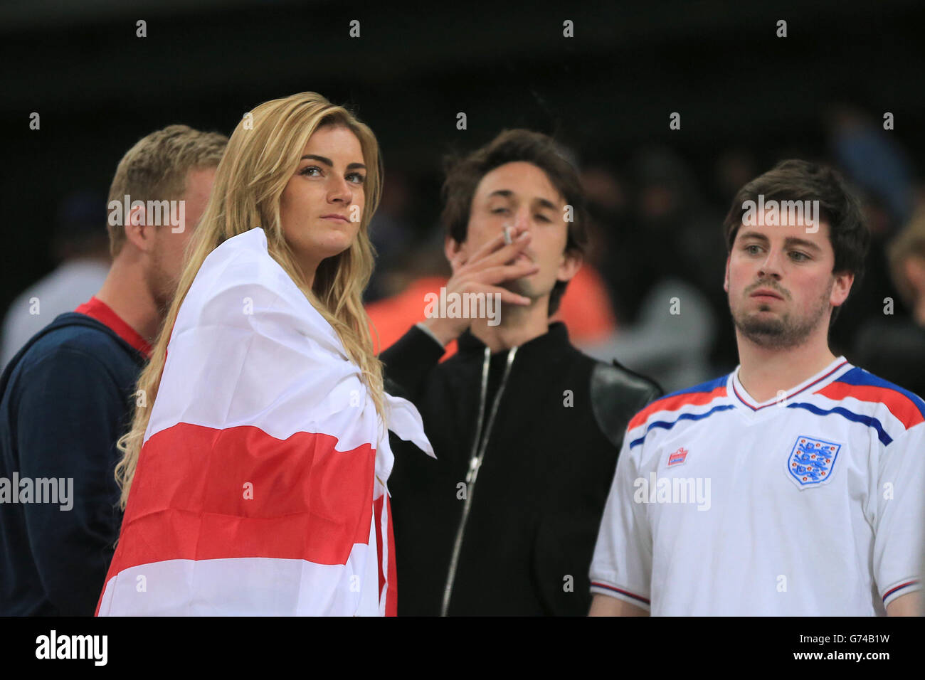England fans are left dejected after the final whistle during the Group ...