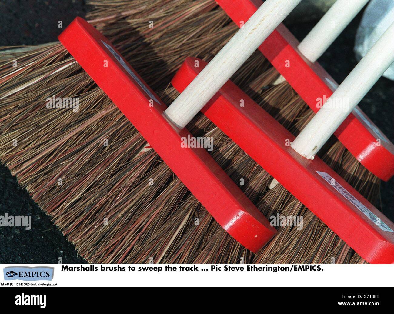 Motor Racing. Belgian Grand Prix. Marshalls brush to sweep the track ...