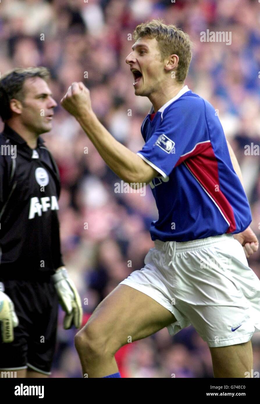 Rangers Tore Andre Flo celebrates his first goal as Aberdeens ...