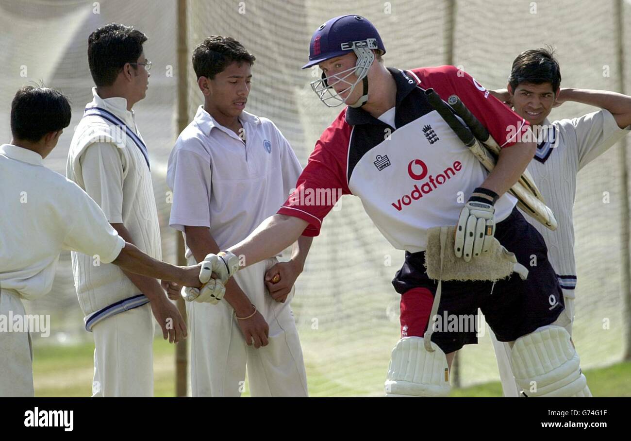 England all-rounder Andrew Flintoff, shakes hands with the young school ...